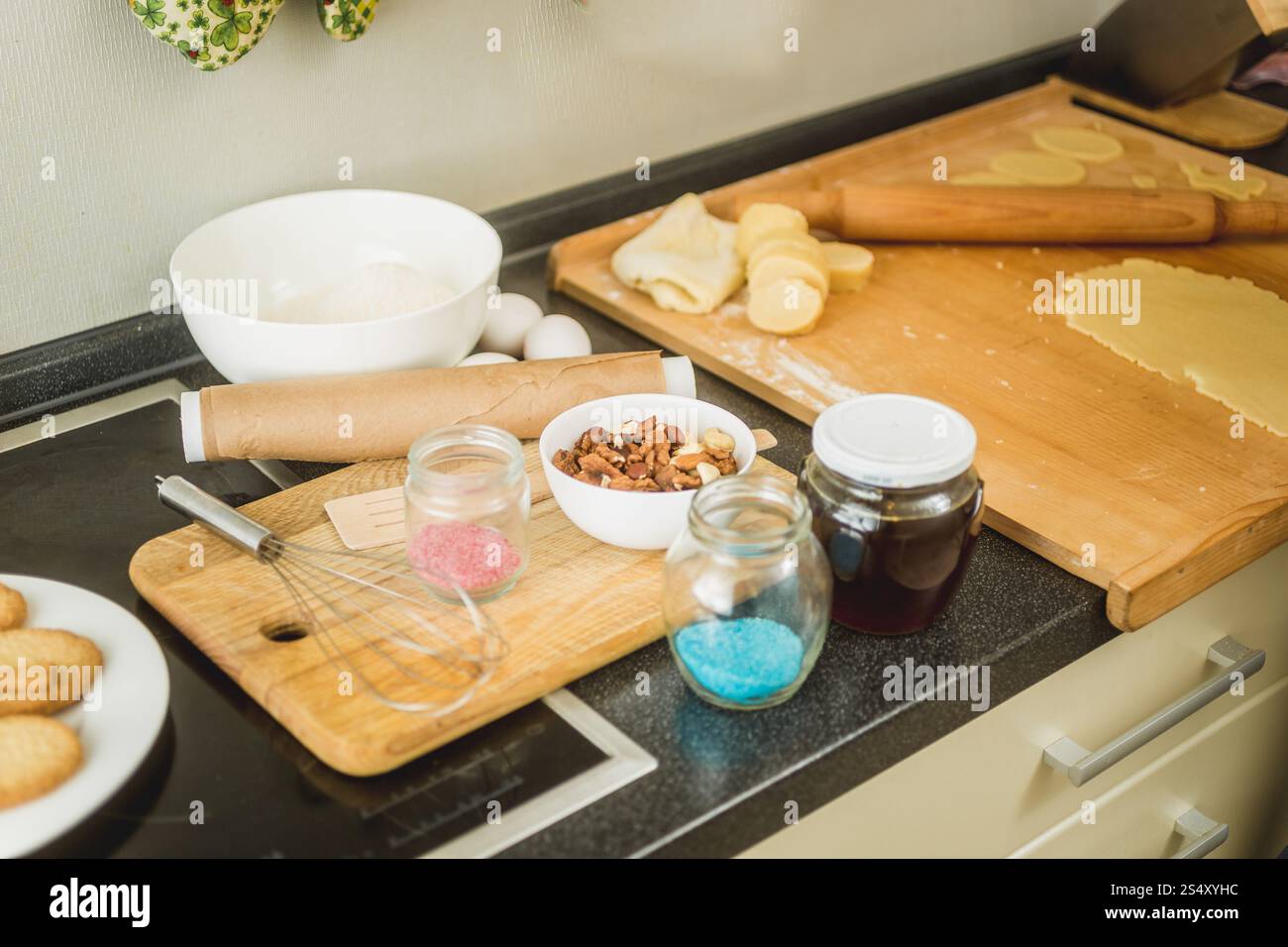 Messy kitchen with ingredients for baking lying on working table Stock ...