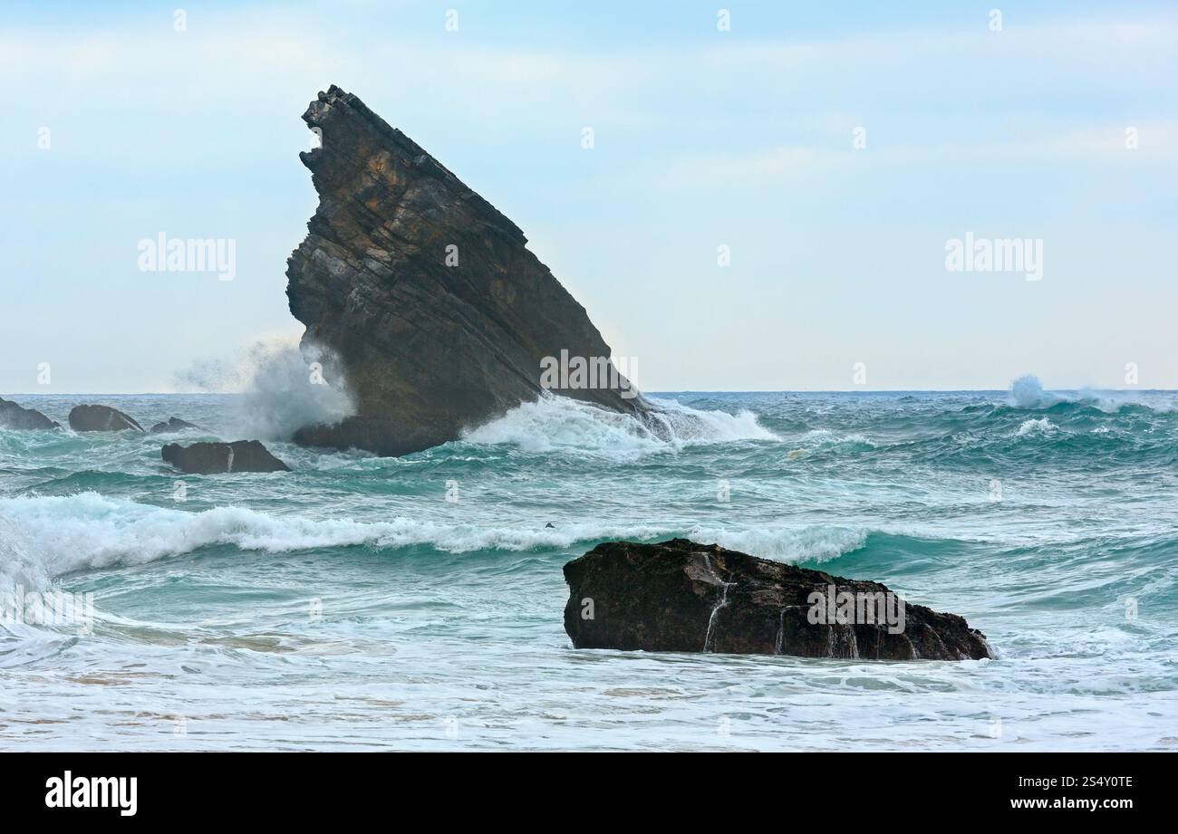 Atlantic ocean coast view (granite boulders and sea cliffs) in cloudy ...
