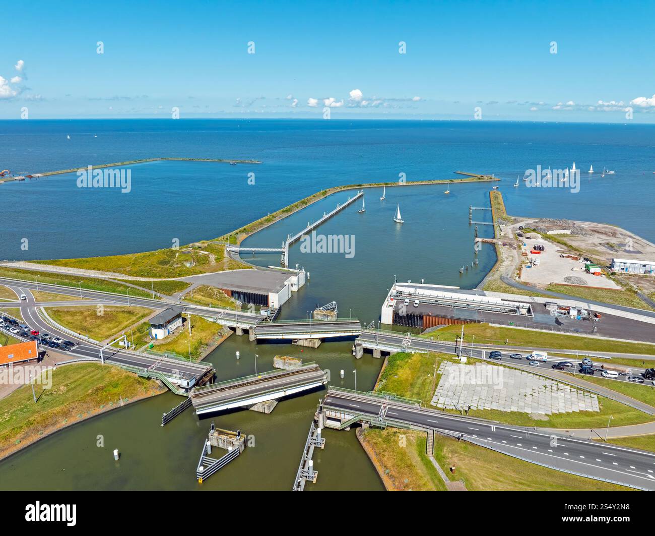 Aerial from the swing bridge at Kornwerderzand at the Afsluitdijk in the Netherlands Stock Photo ...