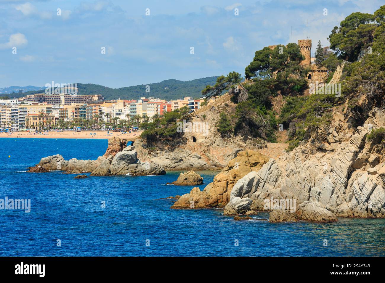 Summer sea rocky coast view with Castle of Sant Joan (Sa Caleta beach ...