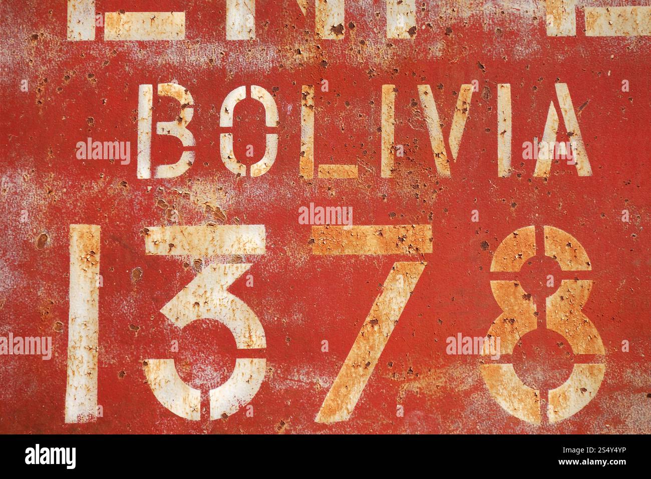 old rusty painted metal wall with inscriptions, wallpaper background ...