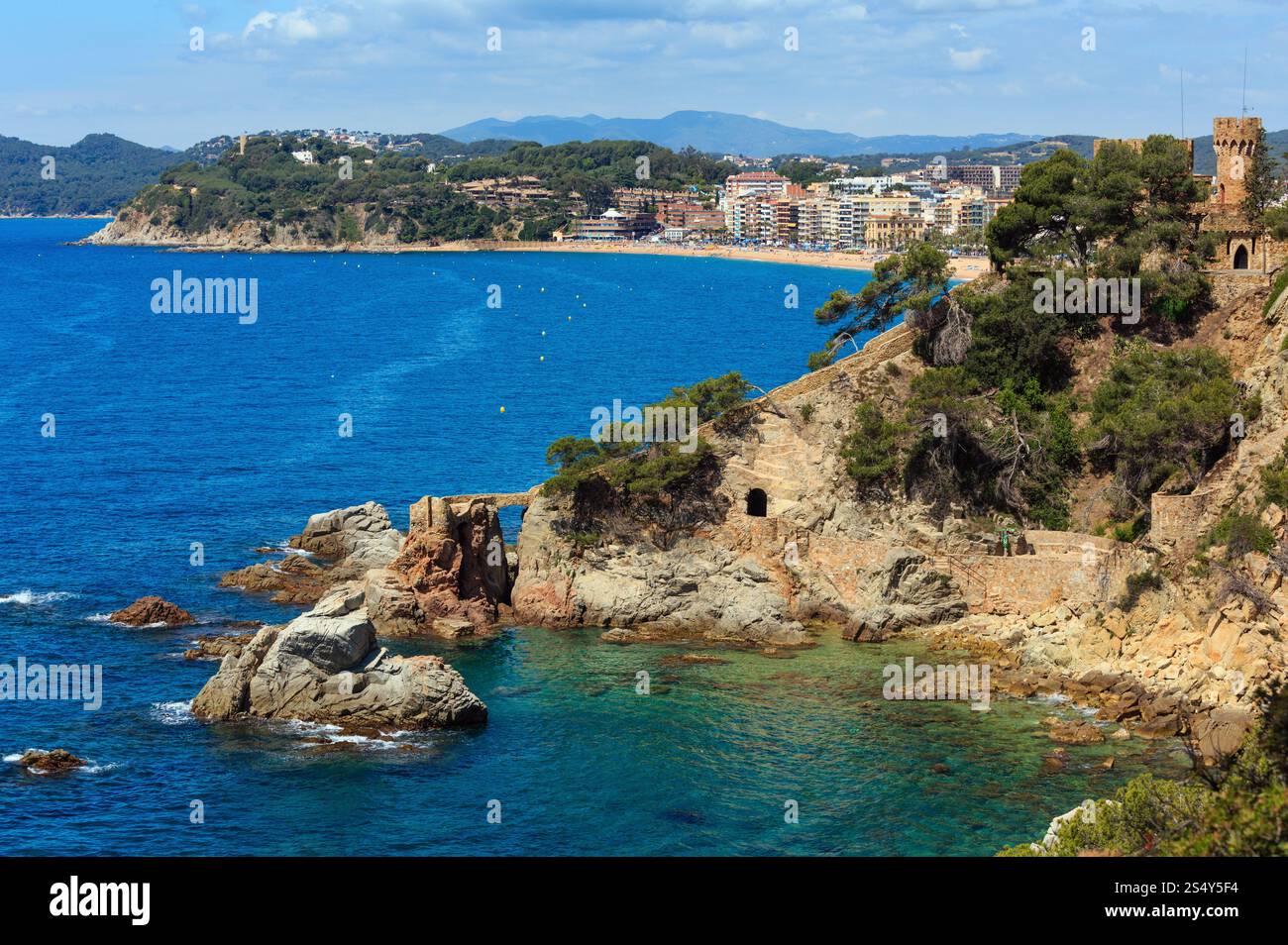 Summer sea rocky coast view with Castle of Sant Joan (Sa Caleta beach ...