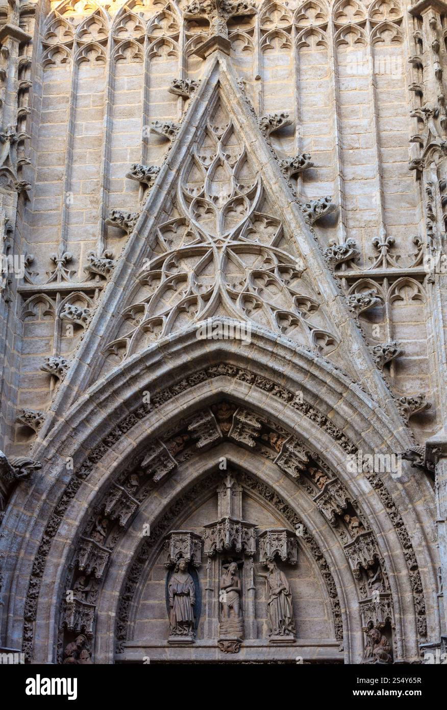 Architecture details over entrance door of Seville Cathedral (or ...