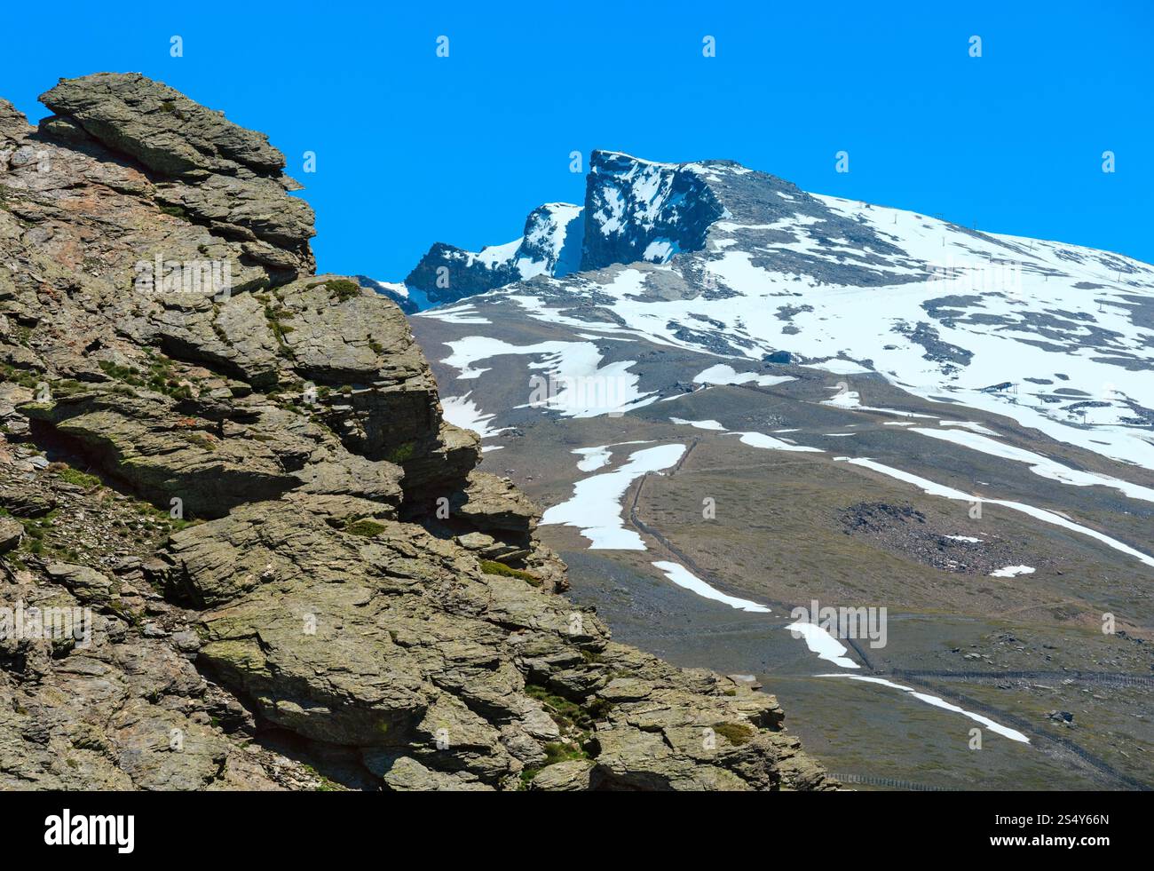 Summer mountain landscape with snow on slope (Sierra Nevada National ...