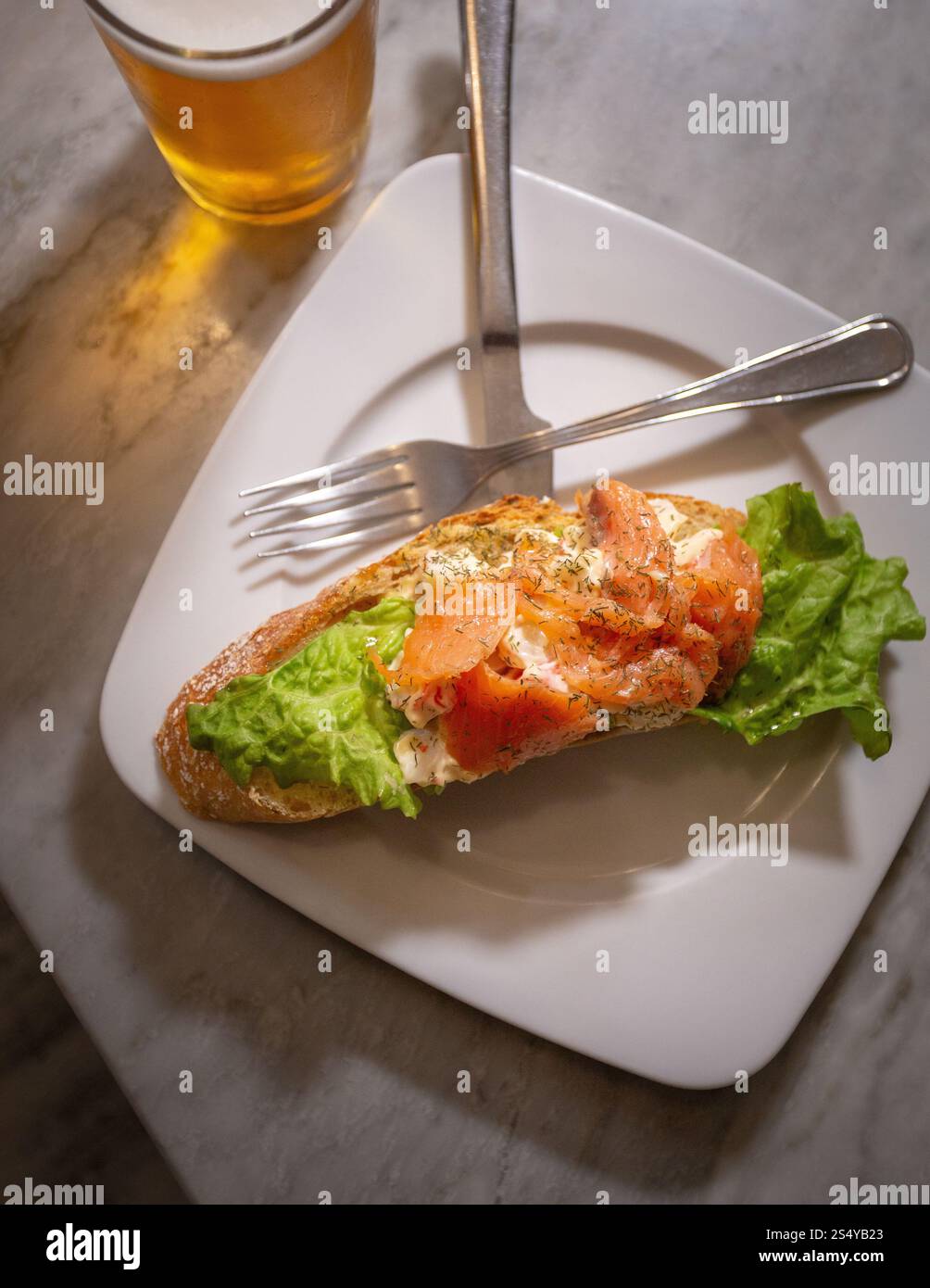 A Pincho with Beer ready to eat, top view. The Pincho is a typical ...