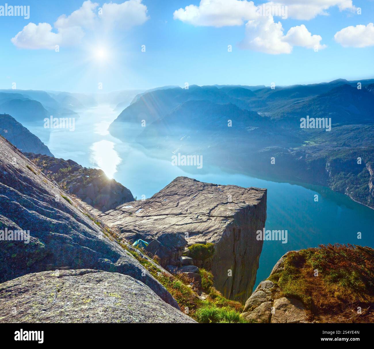 Famous morning sunshiny Preikestolen massive cliff (Norway, Lysefjorden ...