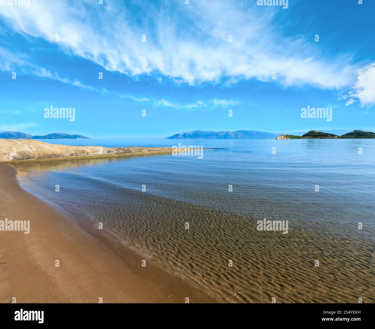 Sandy beach morning landscape (Narta Lagoon, Vlore, Albania). Bllue sky ...