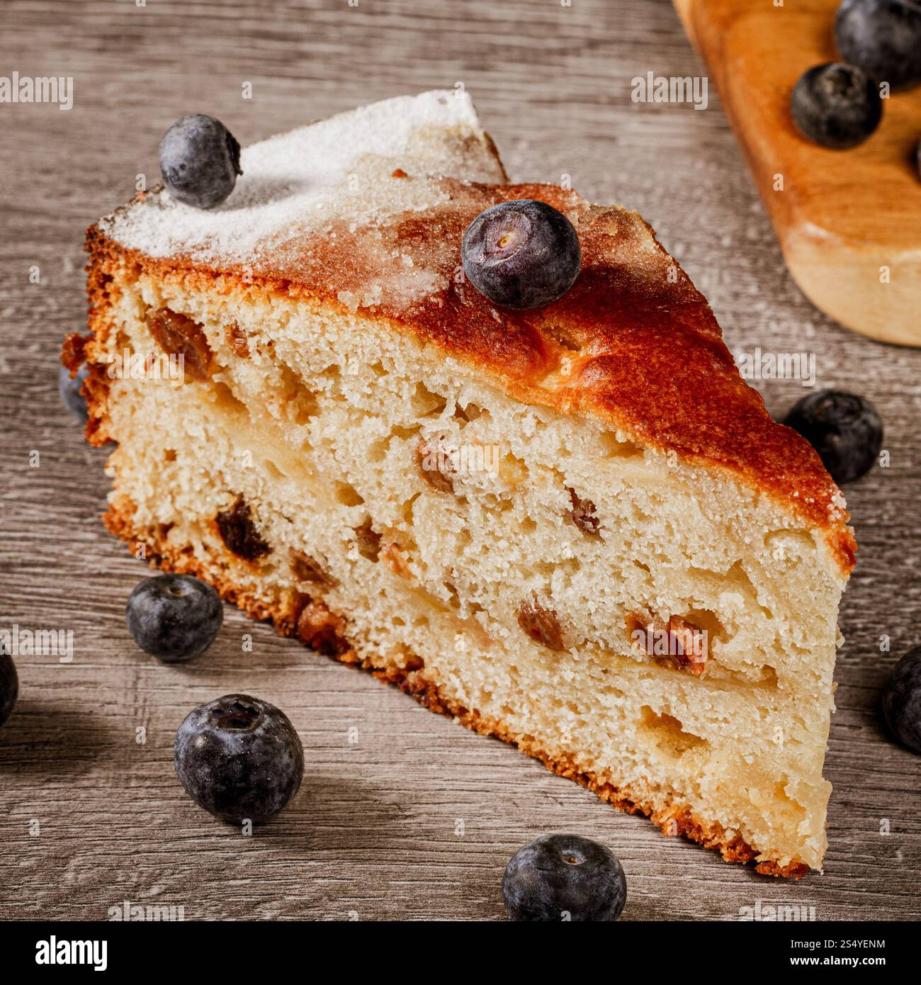 Homemade raisin and blueberry muffin, front view, close-up Stock Photo ...