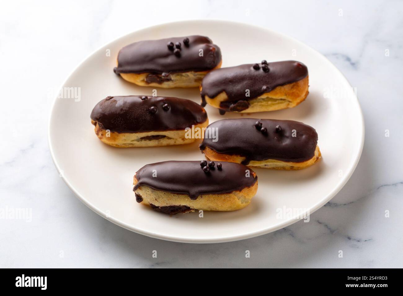 Traditional french eclairs with chocolate Stock Photo - Alamy