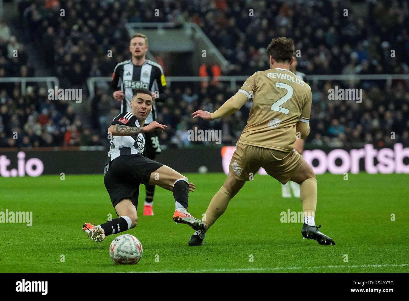 Newcastle United's Miguel Almiron in action with Bromley's Callum ...