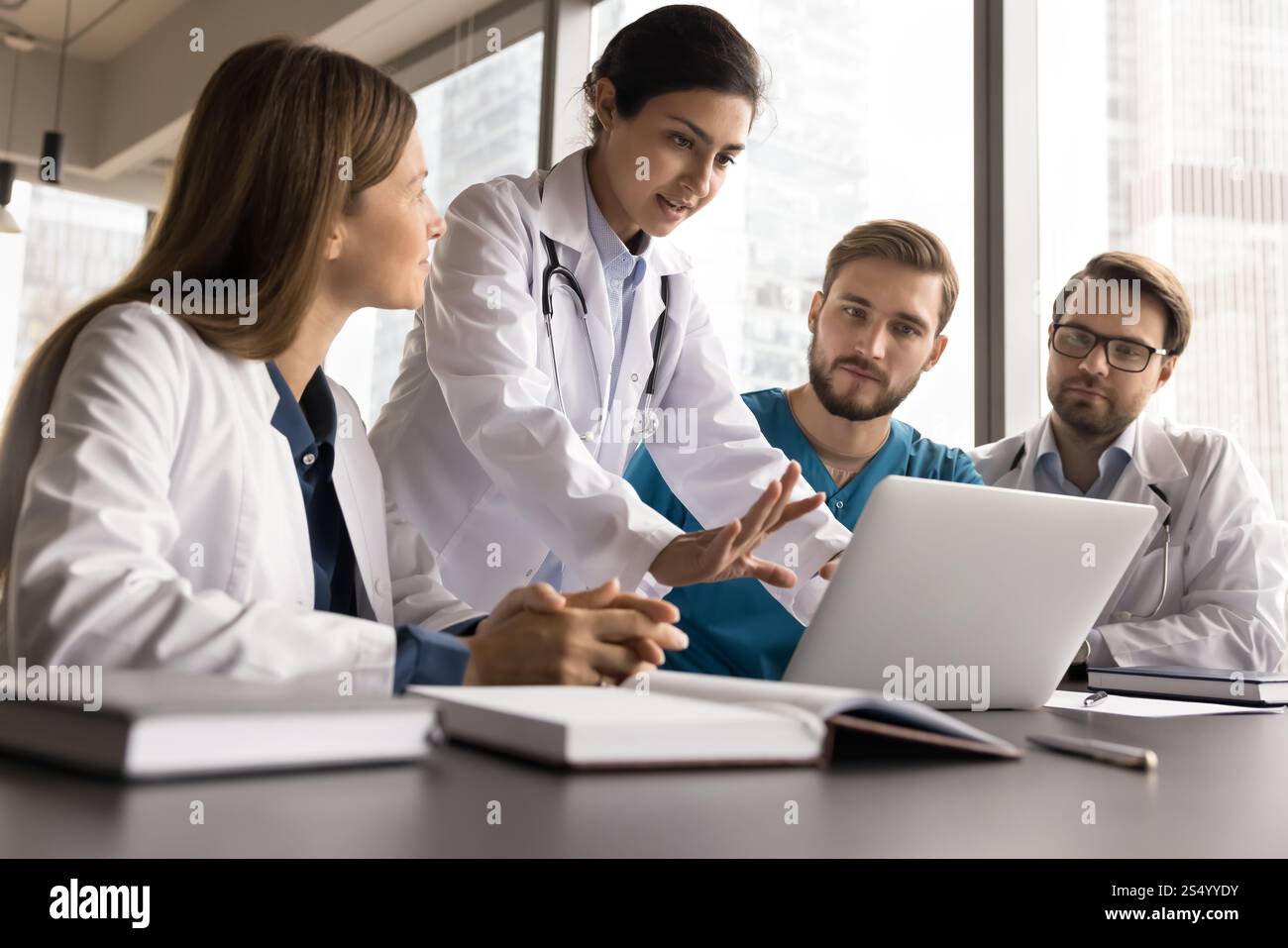 Group of skilled medical workers in uniforms engaged in teamwork Stock ...