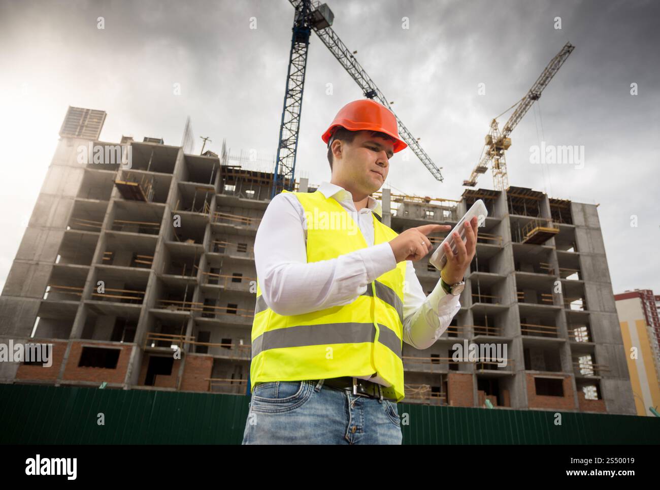 Portrait architect holding hardhat hi-res stock photography and images ...