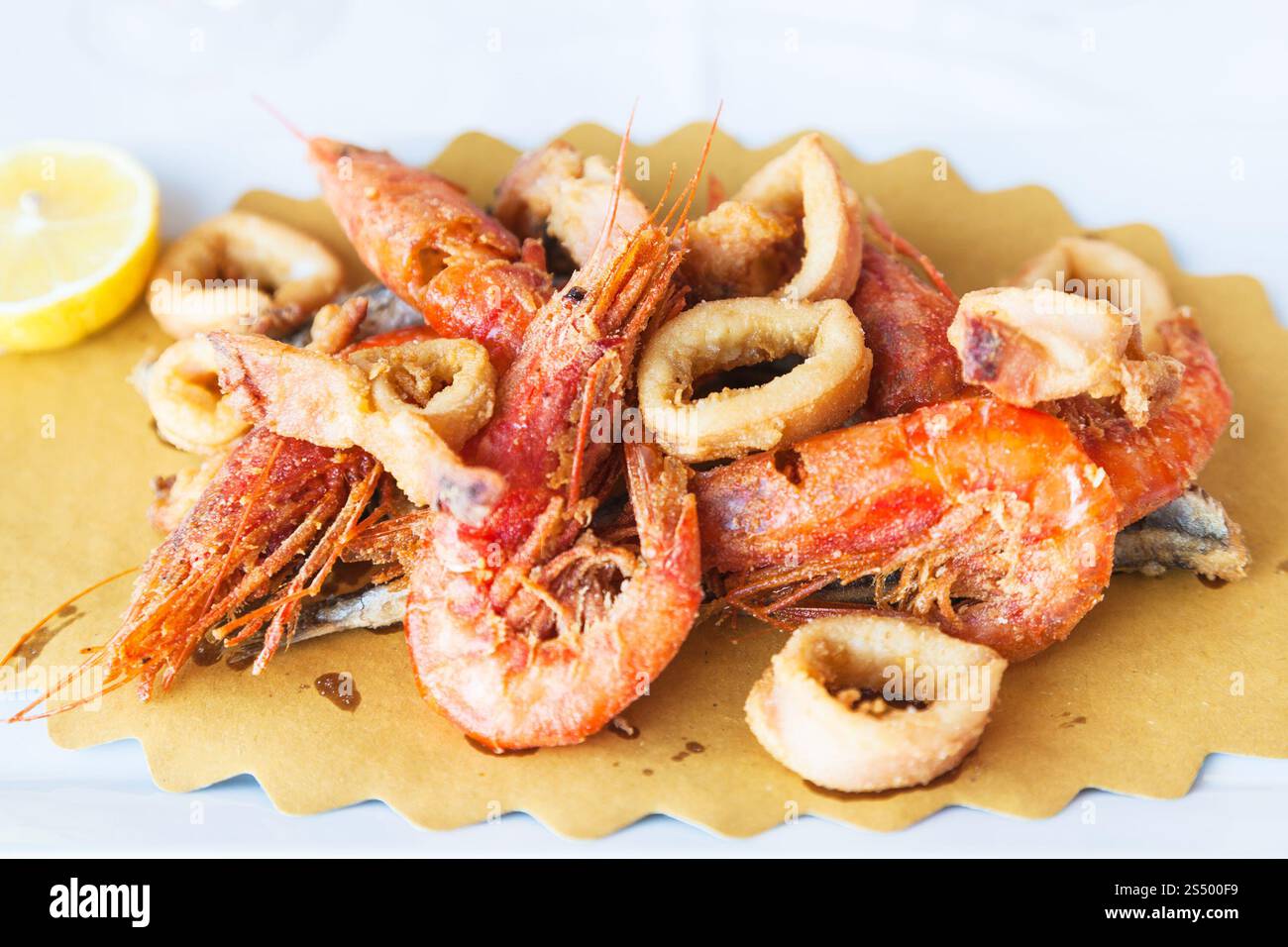 typical italian food - plate with fried local seafood in sicilian ...