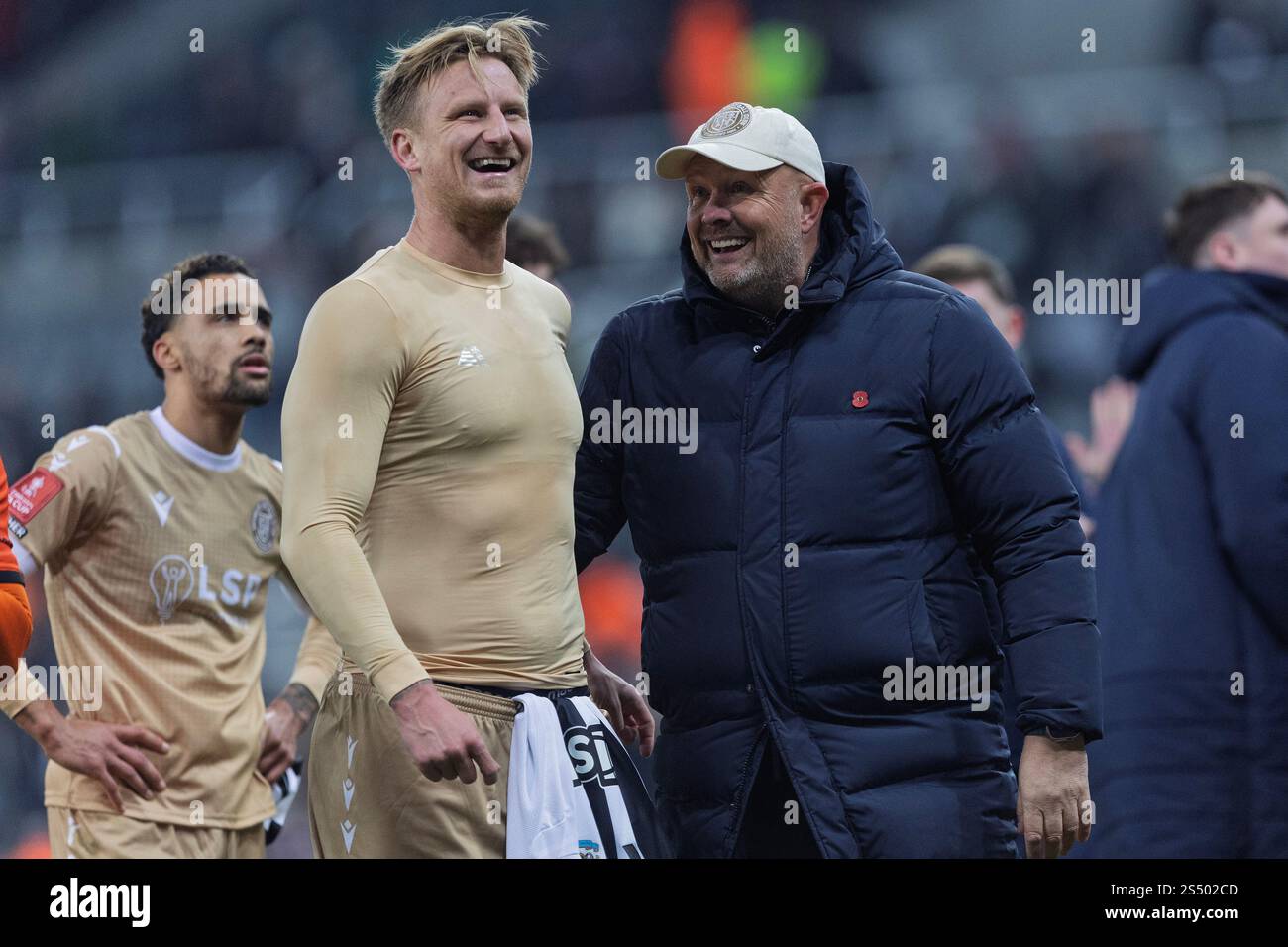 Bromley manager Andy Woodman (r) and Byron Webster are seen after the ...