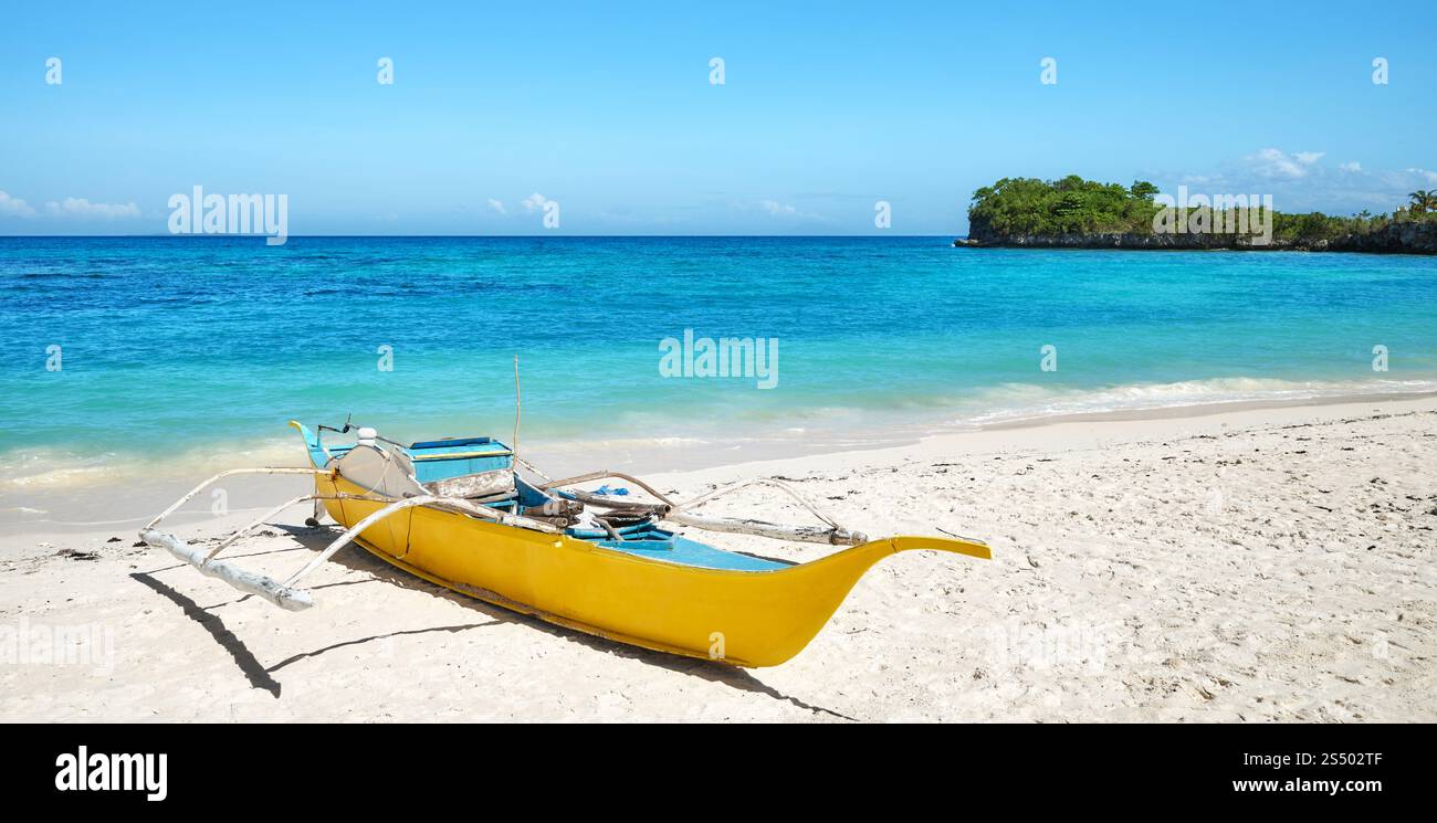 Bangka boat on a beach, Malapascua Island, Philippines Stock Photo - Alamy
