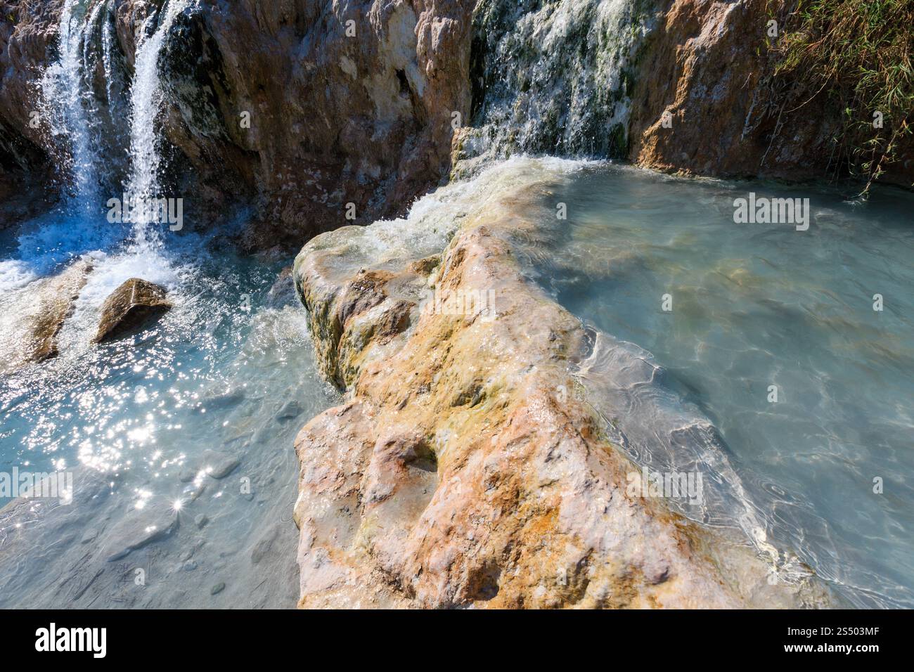 Natural spa with waterfalls and hot springs at Saturnia thermal baths ...