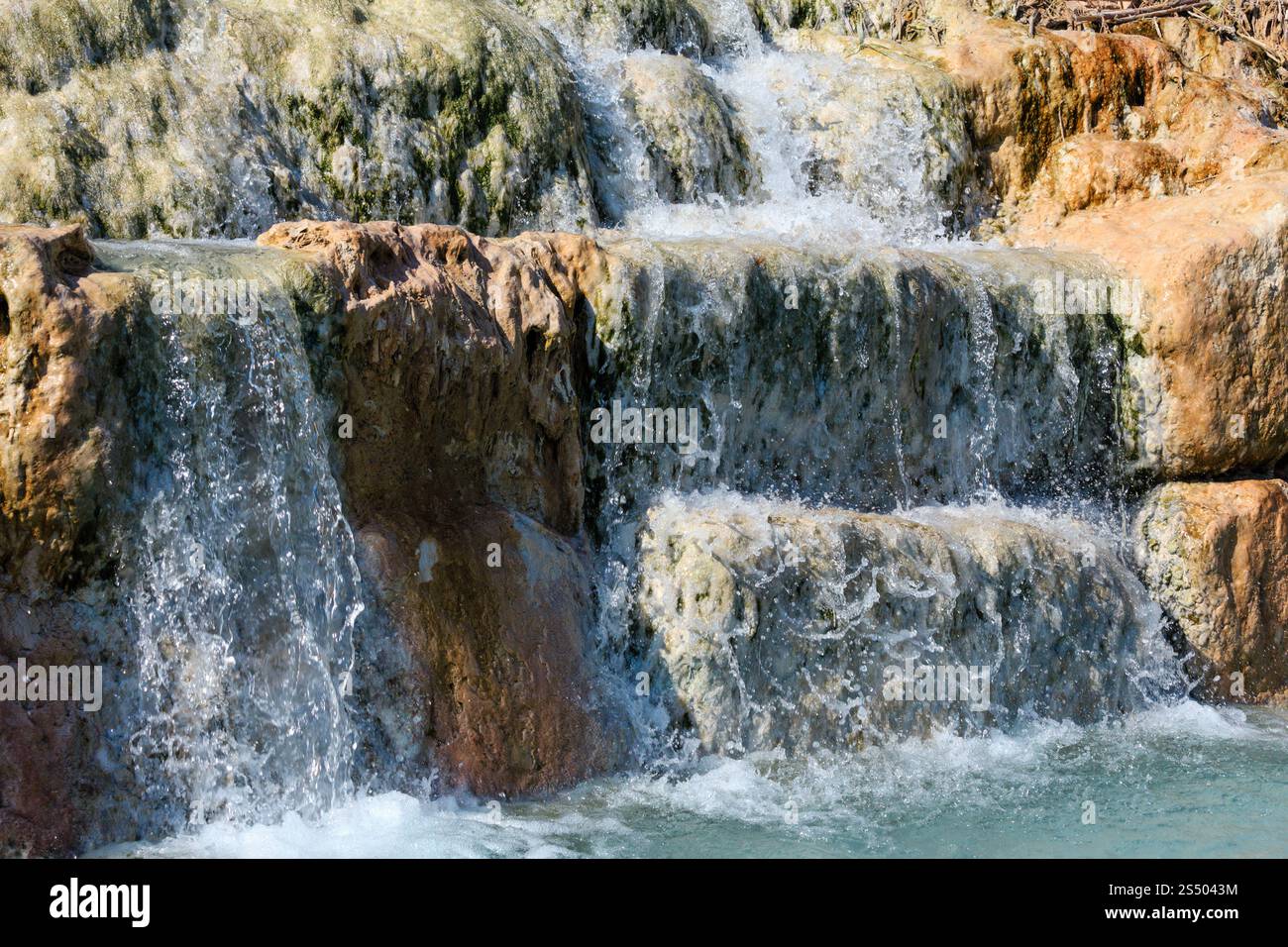 Natural spa with waterfalls and hot springs at Saturnia thermal baths ...
