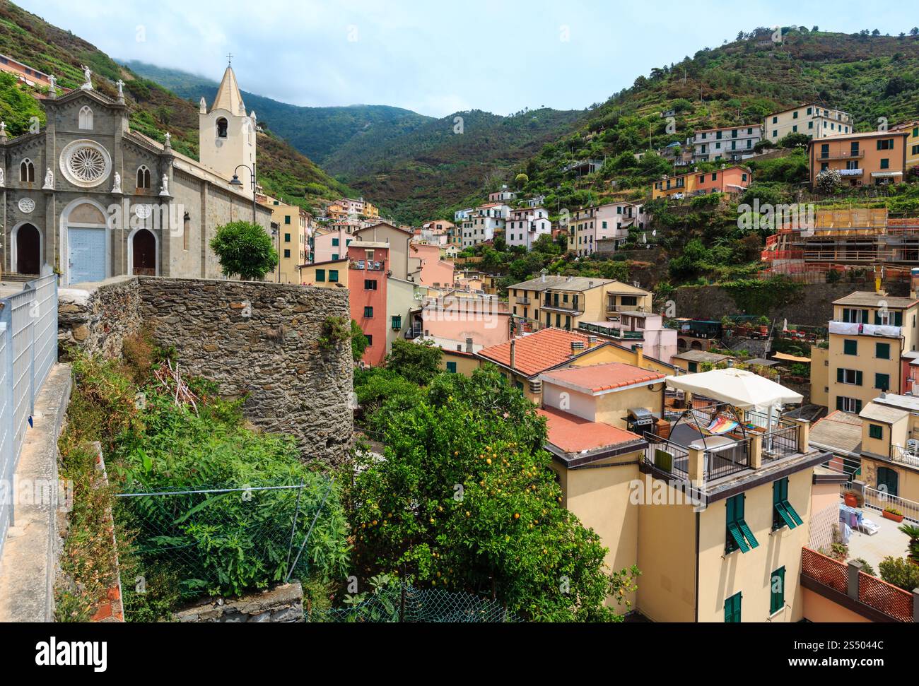 Beautiful summer Riomaggiore - one of five famous villages of Cinque ...