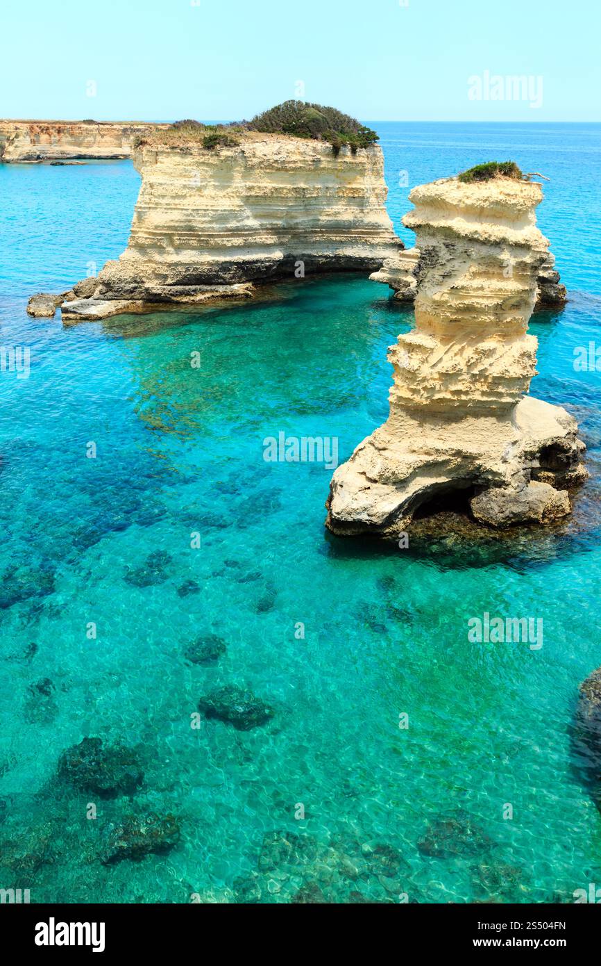 Picturesque seascape with cliffs and rocky stacks (faraglioni), at ...