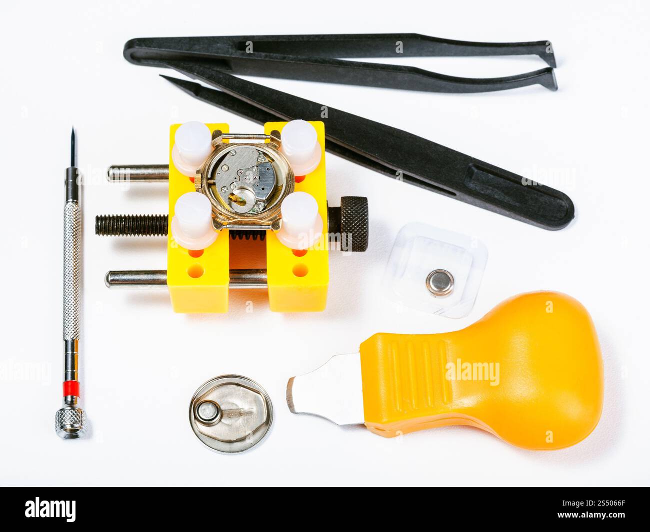 watchmaker workshop - top view of set of tools for replacing battery in ...