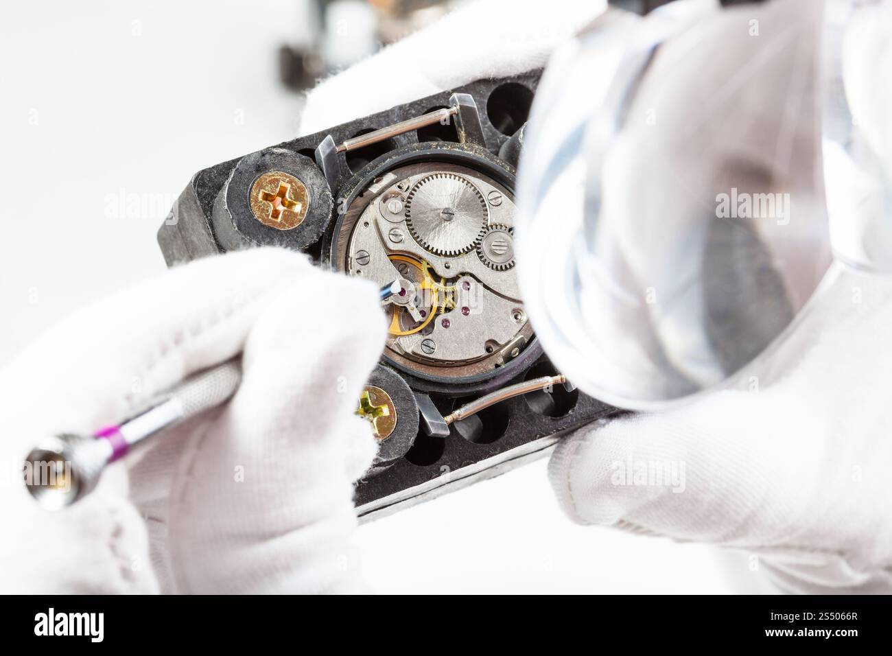 Watchmaker adjusts mechanism old hi-res stock photography and images ...