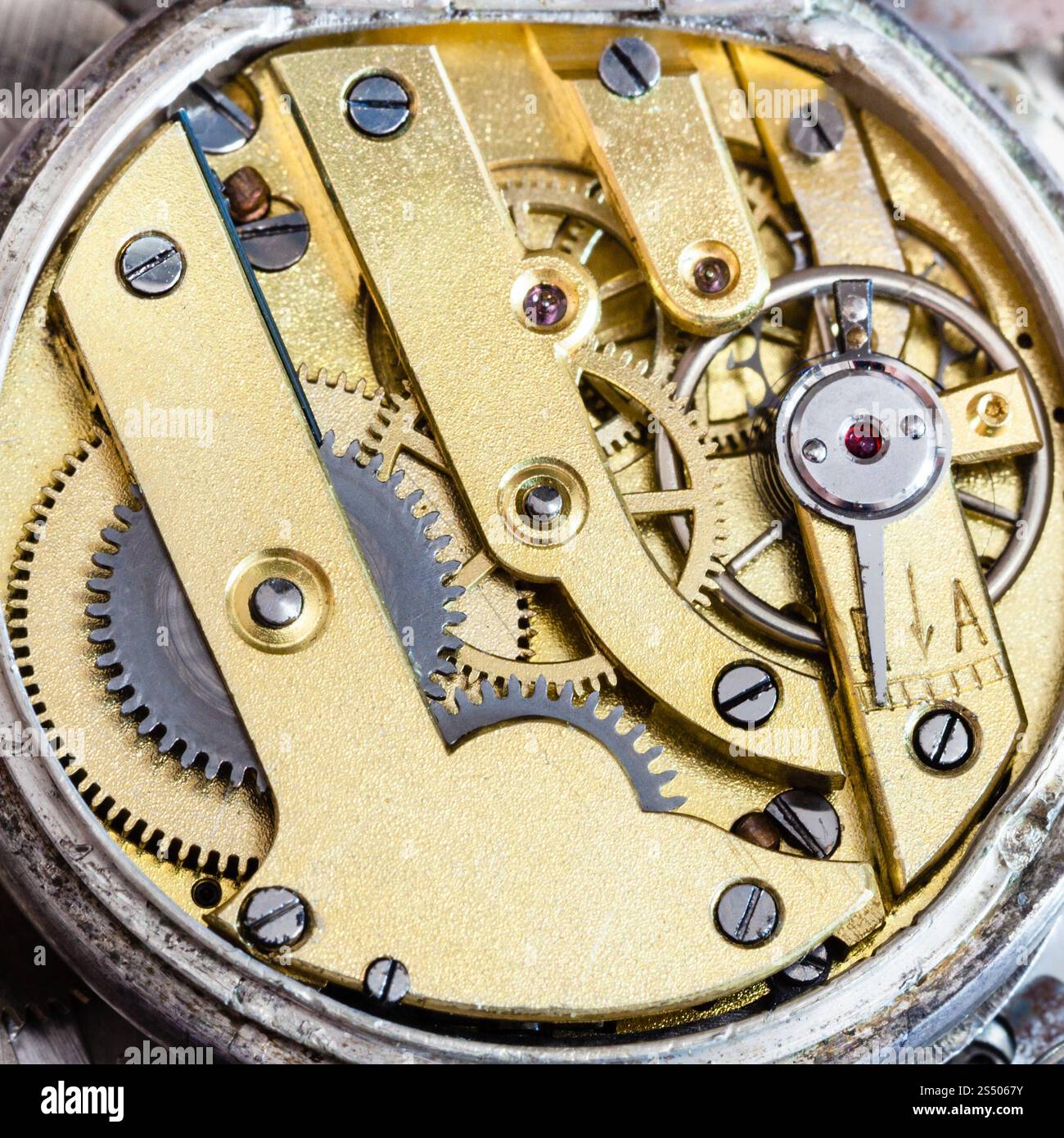 watchmaker workshop - brass clockwork of old mechanical pocket watch ...