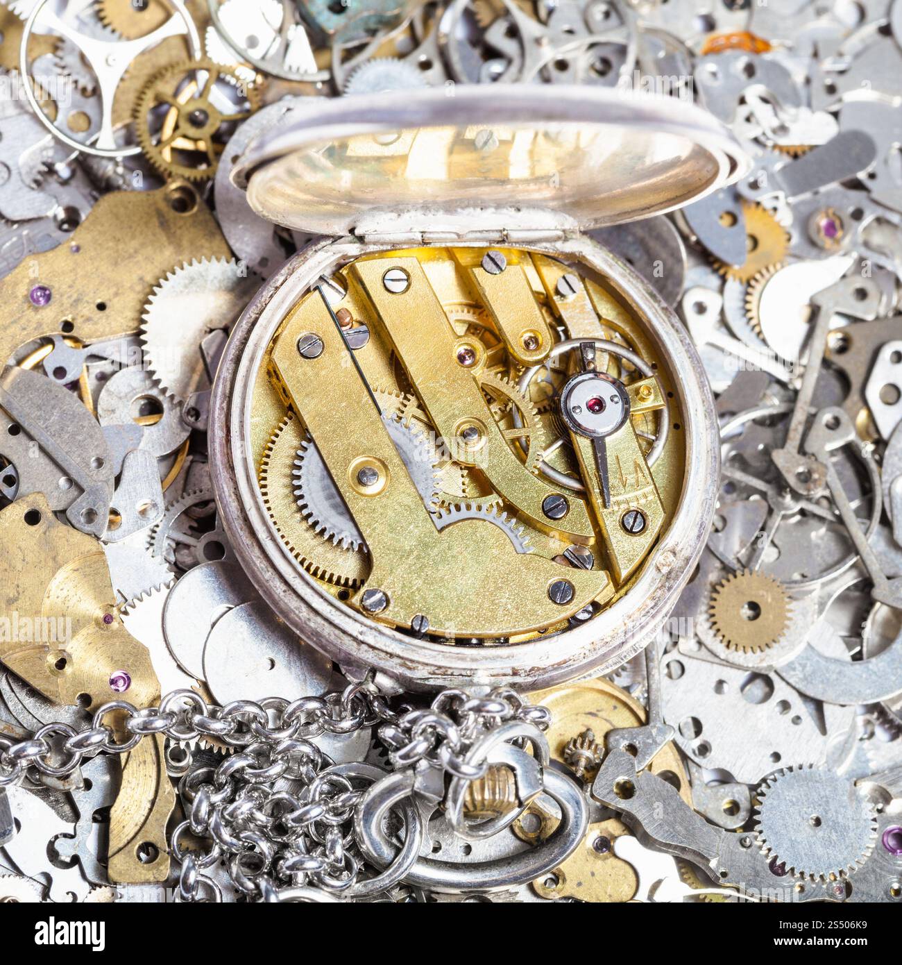 watchmaker workshop - open retro silver pocket watch with brass ...