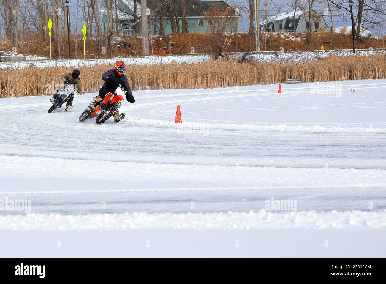 Webster, NY, USA - January 11th 2025 - Motorcyclists race around an ice ...