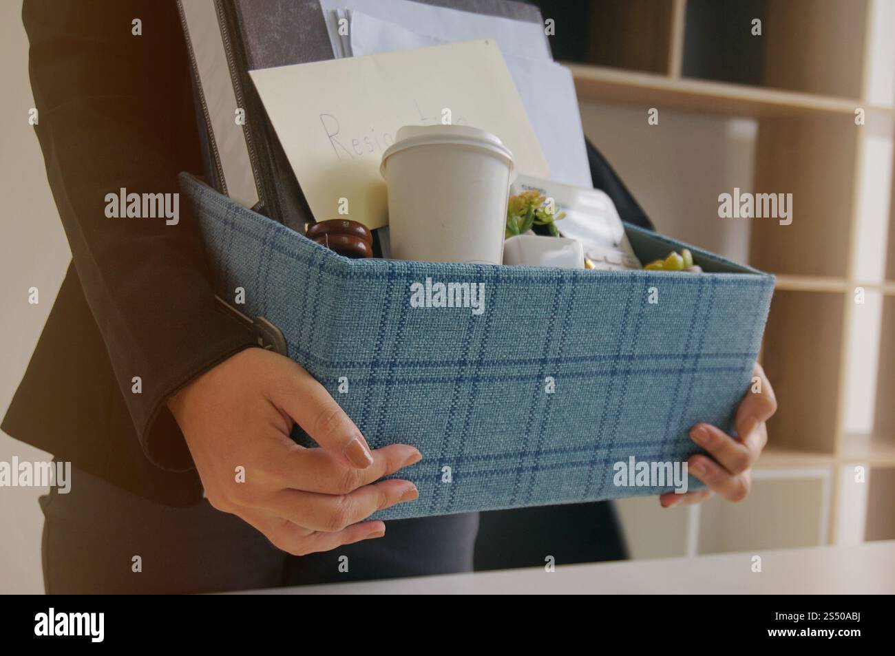 Woman taping up cardboard hi-res stock photography and images - Alamy