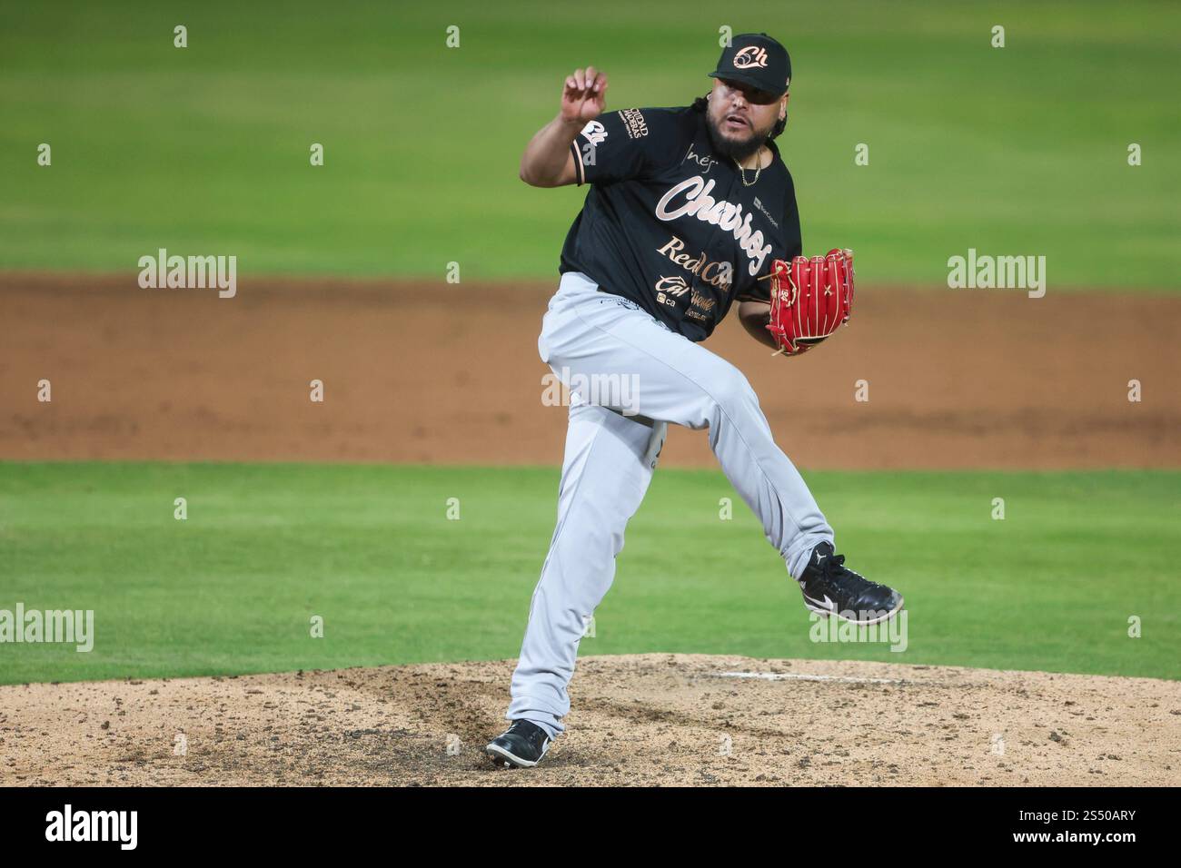 HERMOSILLO, MEXICO - JANUARY 11: Jesus Cruz, relief pitcher for Charros de Jalisco in the eighth ...