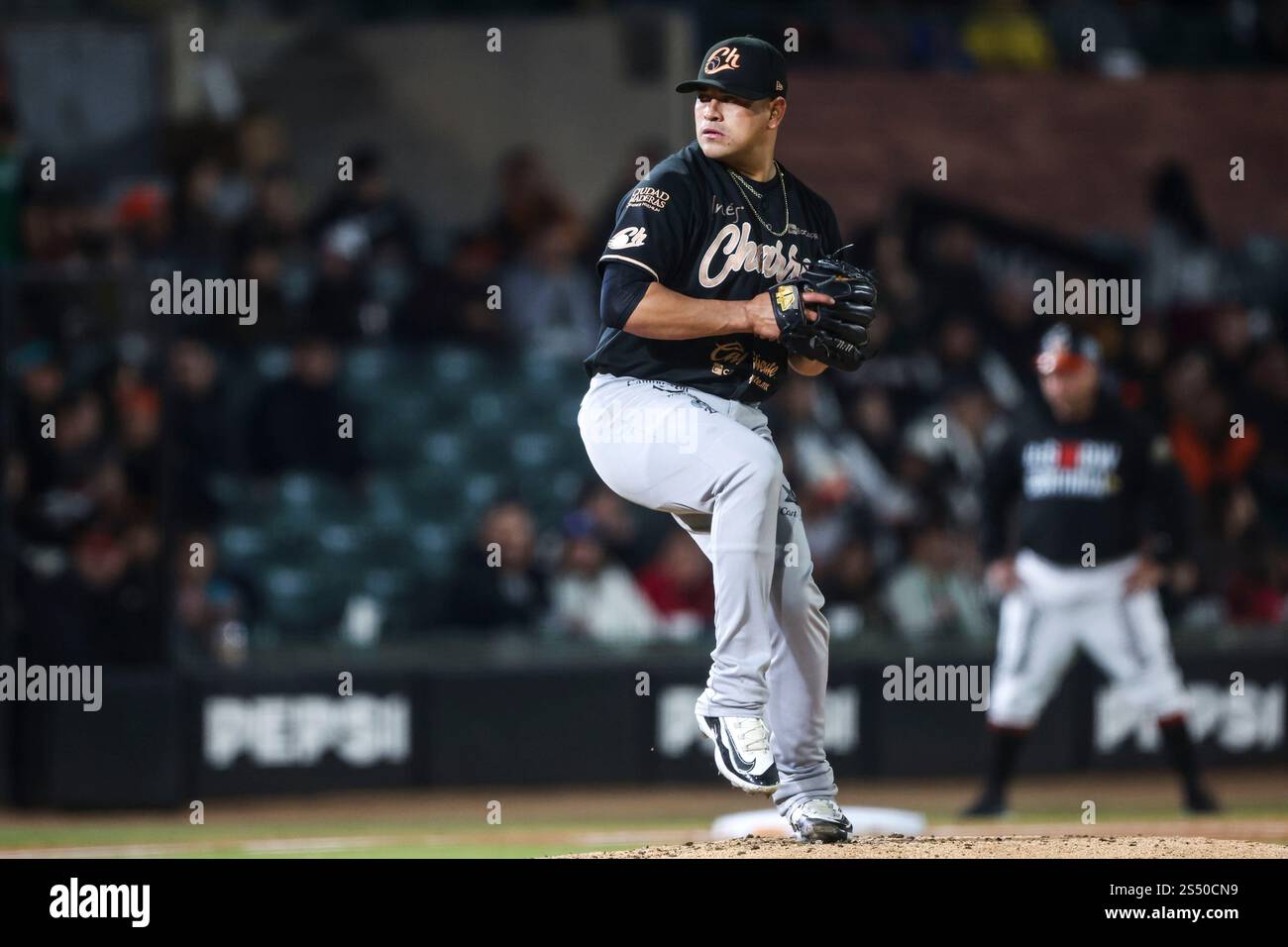 HERMOSILLO, MEXICO - JANUARY 11: Manny Bañuelos starting pitcher for Charros de Jalisco makes a ...