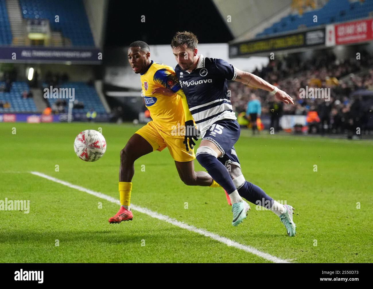 Dagenham and Redbridge's Shiloh Remy and Millwall's Joe Bryan (right ...