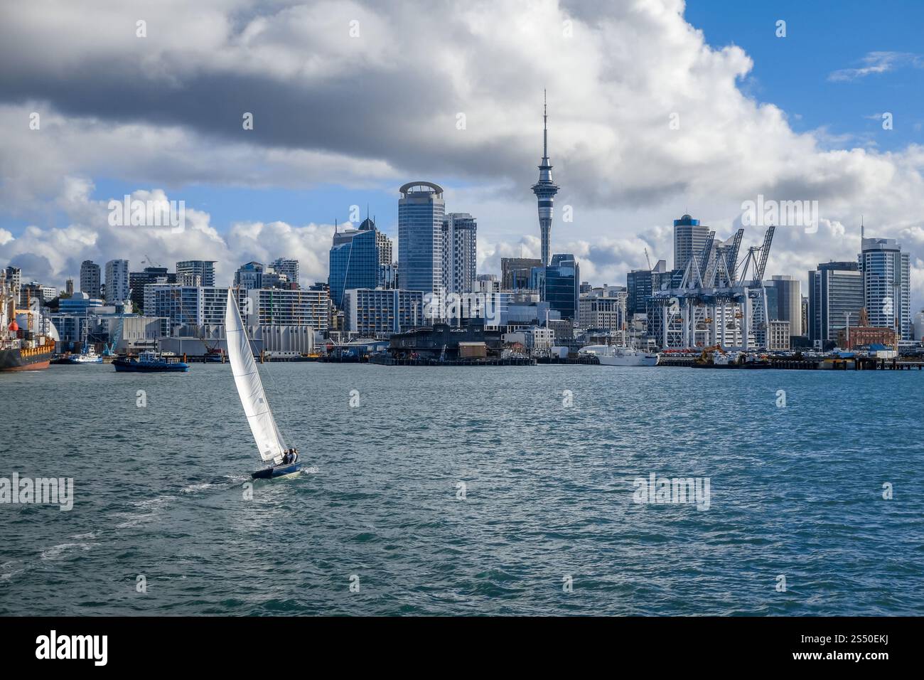 Auckland city center view from the sea and sailing ship, New Zealand ...