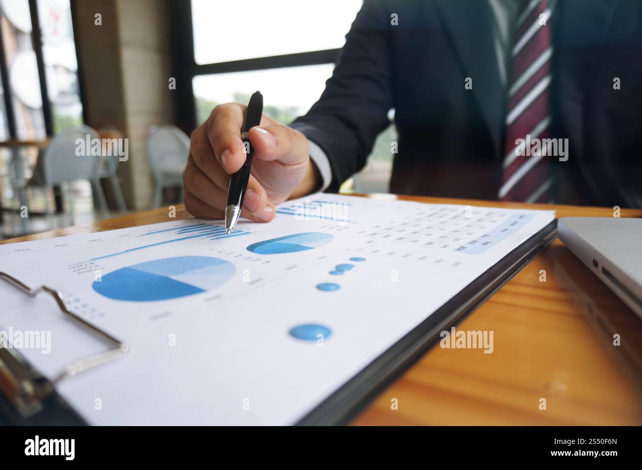 Hands of business people analyzing chart Finance managers task Stock ...