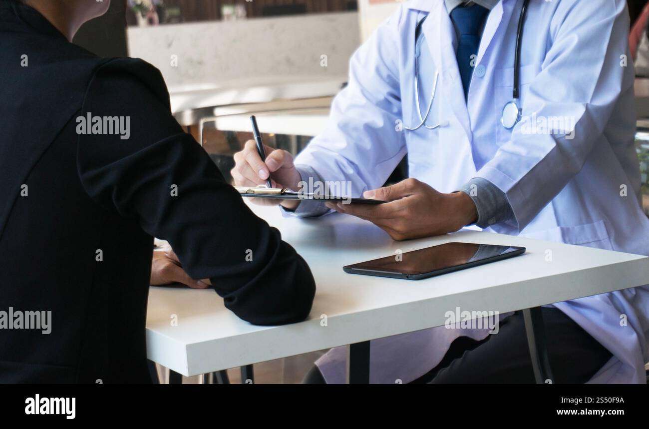 medicine doctor explain diagnosis to doctor team holding and showing ...