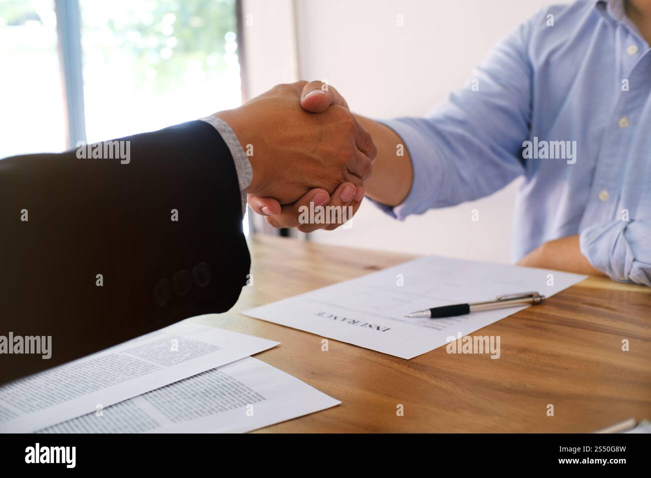 Real estate agent handshake. Business partnership meeting concept. and ...