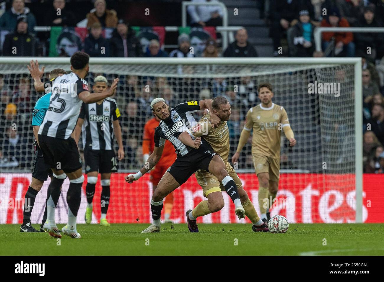 Newcastle United's Joelinton battles with Bromley's Michael Cheek ...
