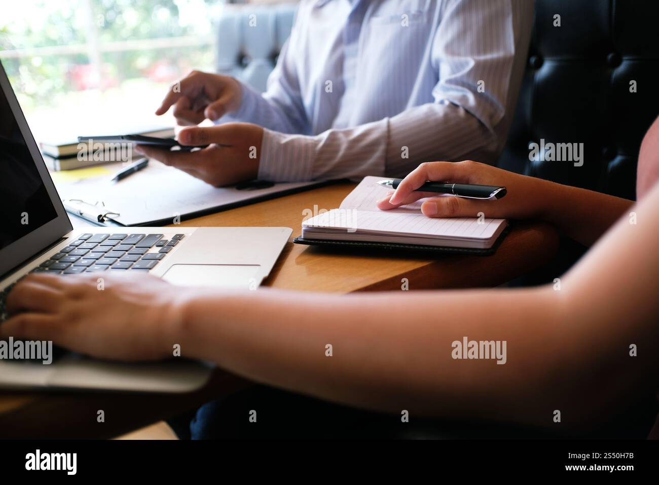 Business people making presentation with his colleagues and business ...