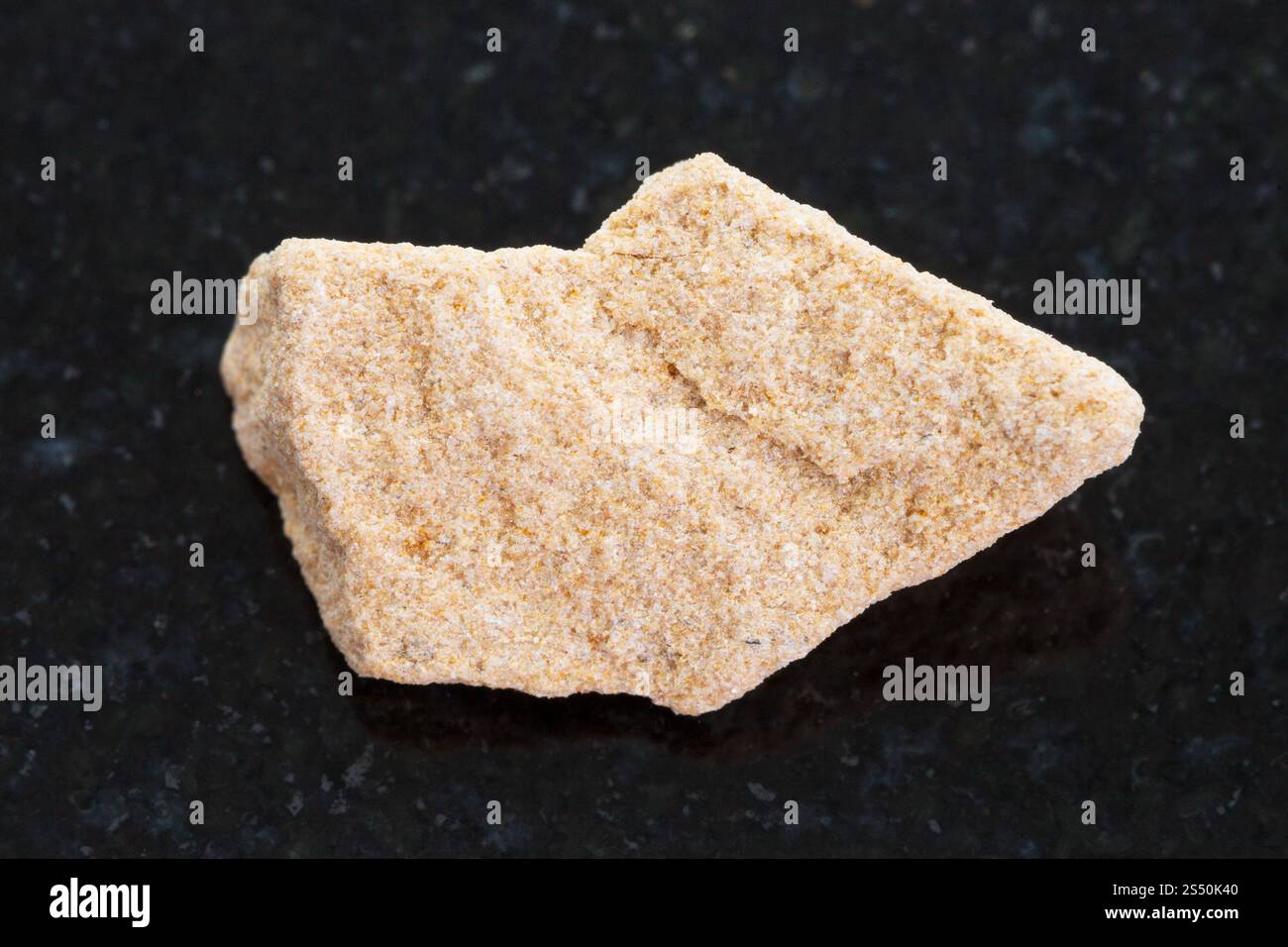 macro shooting of natural mineral rock specimen - rough sandstone stone ...