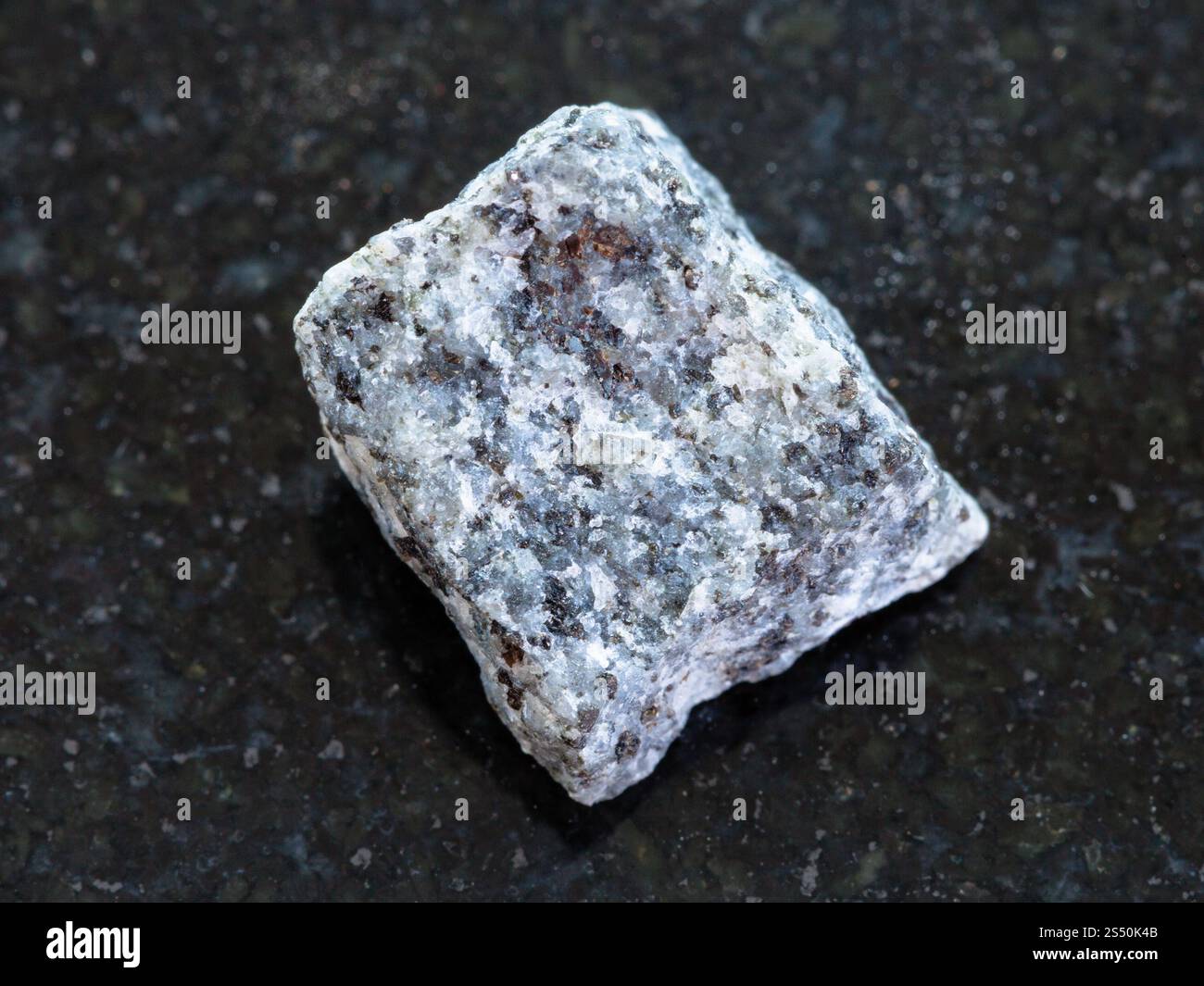 macro shooting of natural mineral rock specimen - raw Gabbro stone on ...