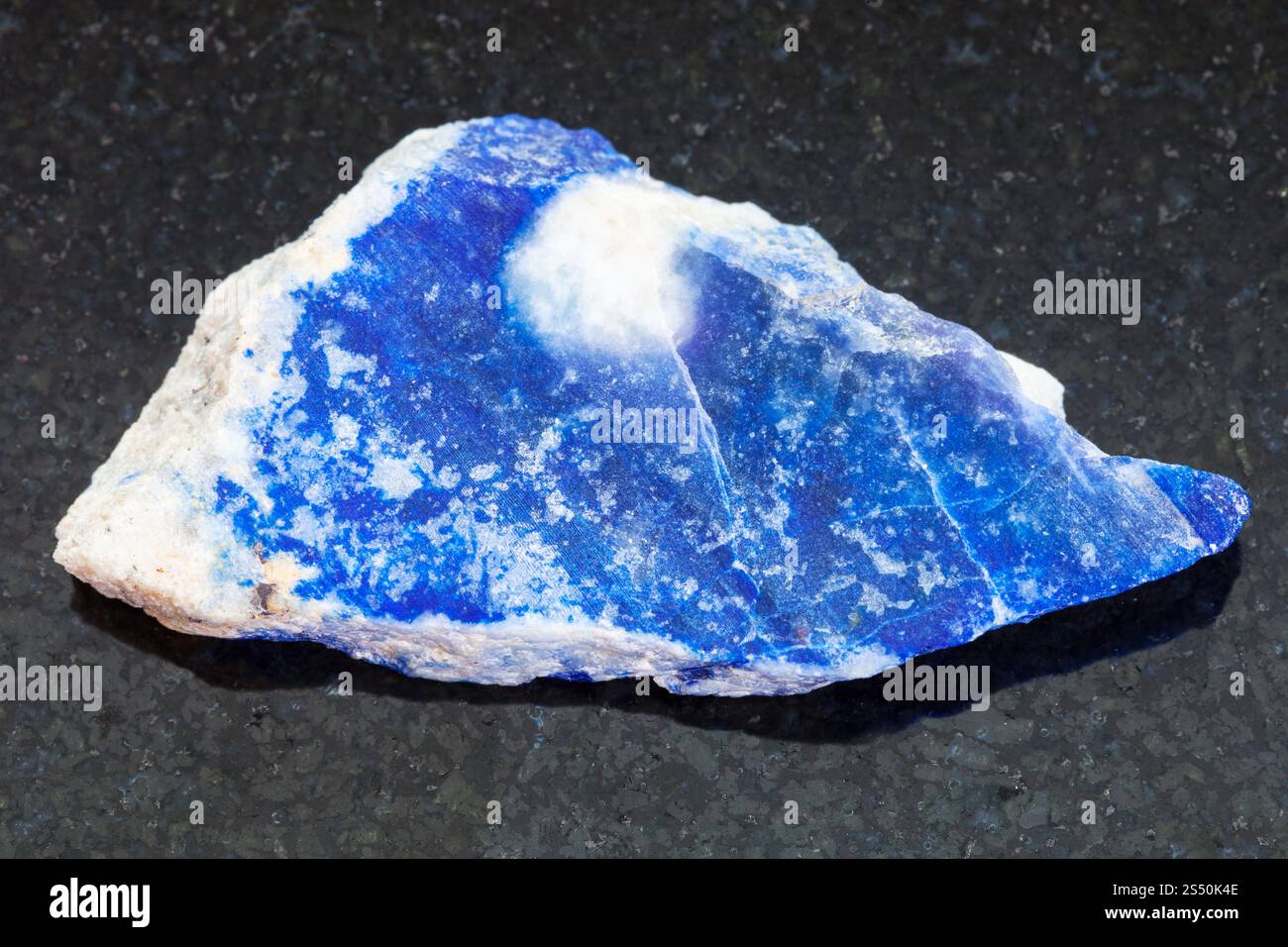 macro shooting of natural mineral rock specimen - raw lazurite (lapis ...