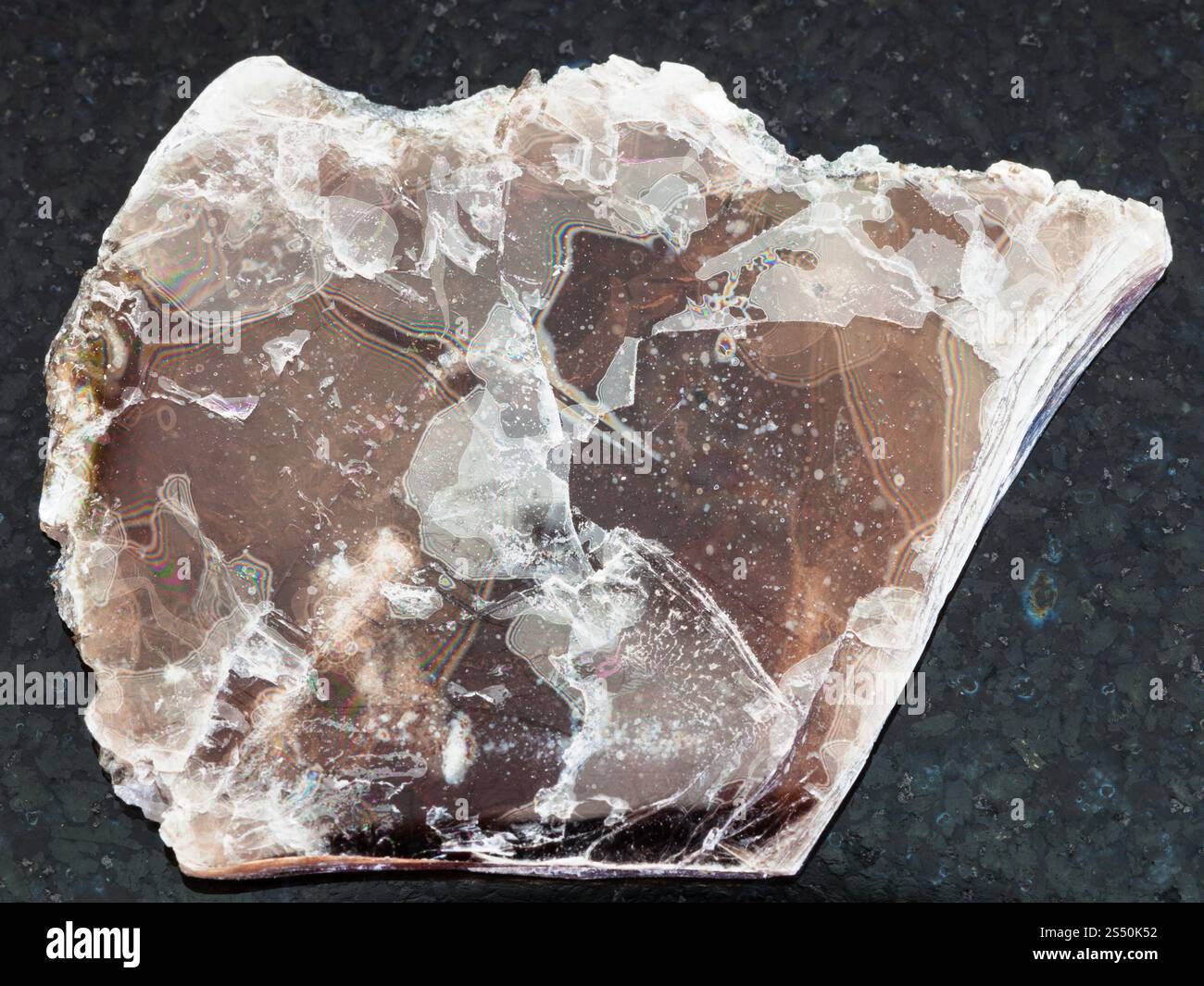 macro shooting of natural mineral rock specimen - rough brown mica ...