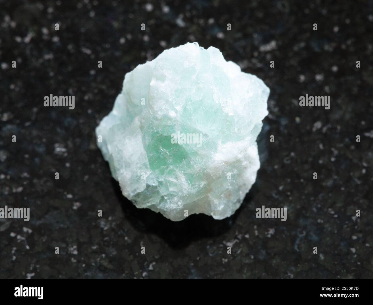 macro shooting of natural mineral rock specimen - raw Fluorite stone on ...