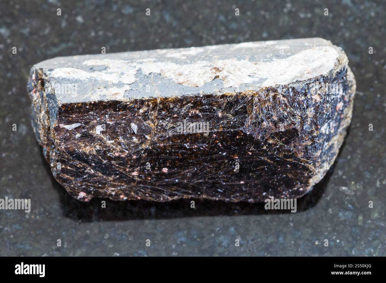 macro shooting of natural mineral rock specimen - crystal of dravite ...