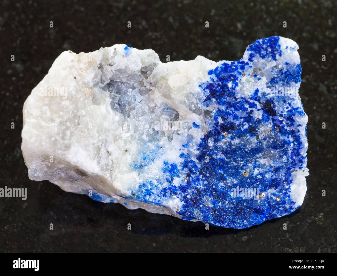 macro shooting of natural mineral rock specimen - rough lapis lazuli ...