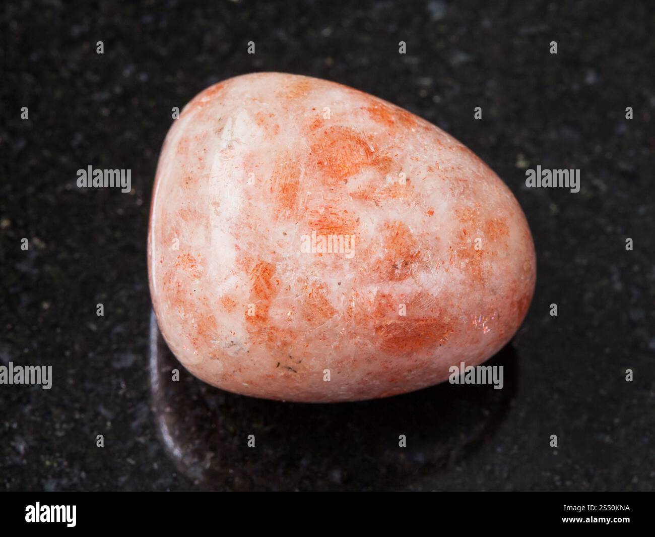 macro shooting of natural mineral rock specimen - polished sunstone ...