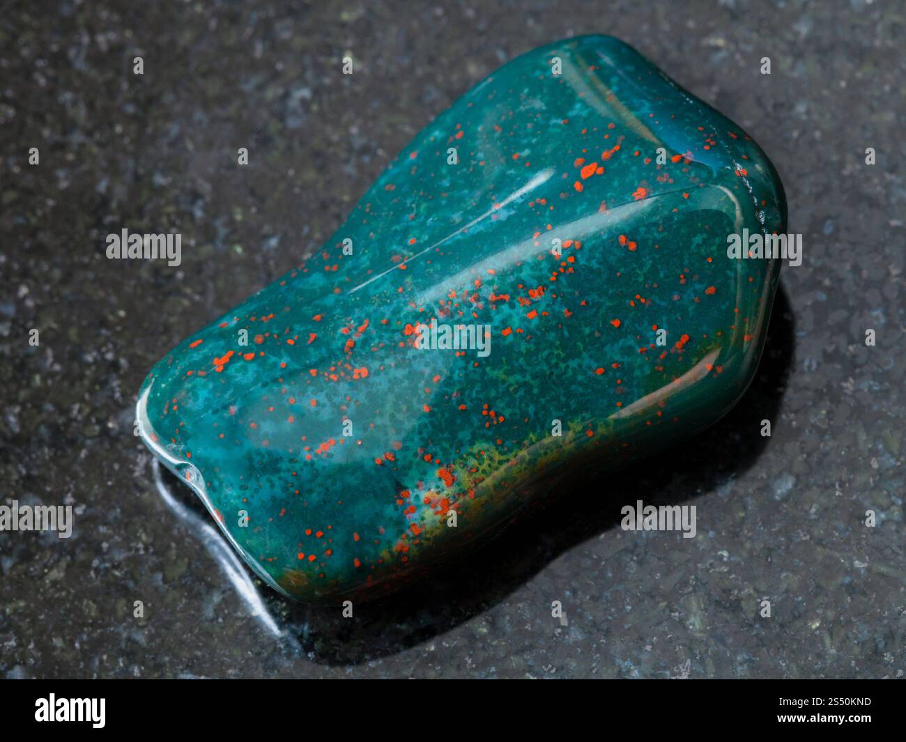 macro shooting of natural mineral rock specimen - polished green ...