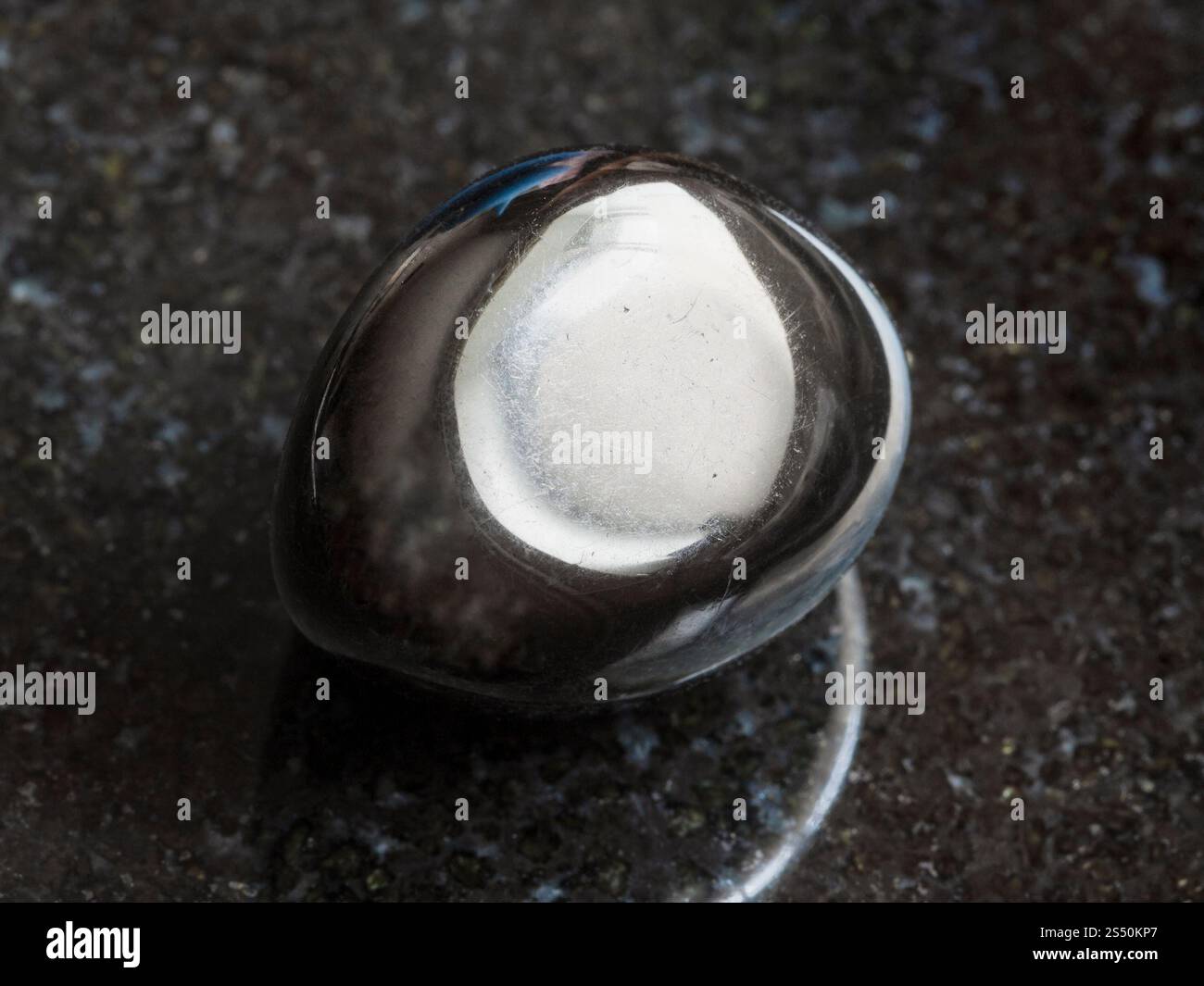 macro shooting of natural mineral rock specimen - tumbled Gagate (Jet ...