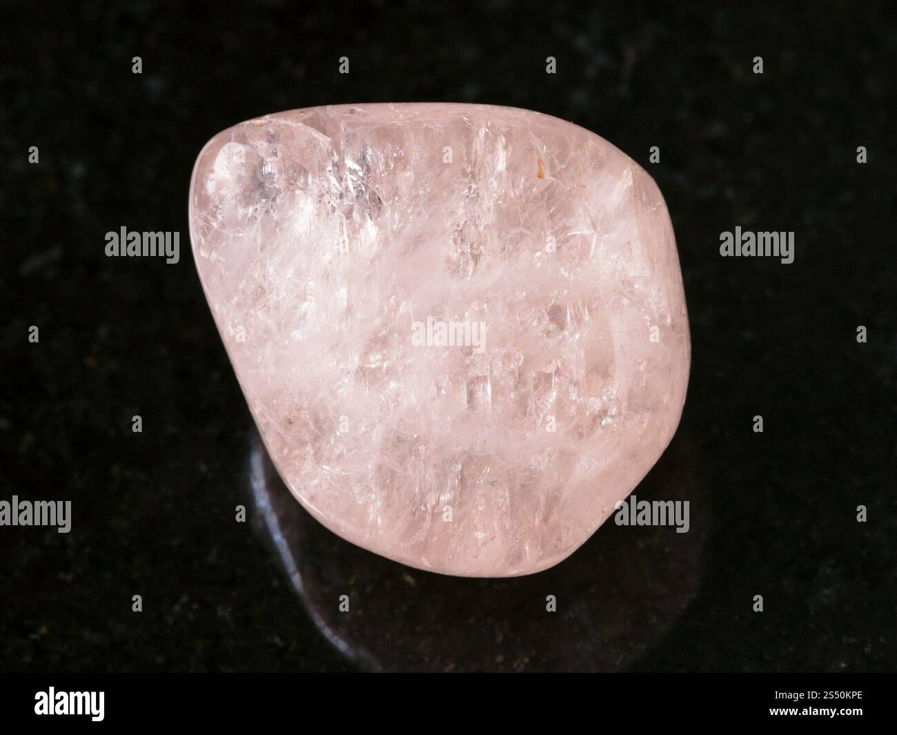 macro shooting of natural mineral rock specimen - tumbled morganite ...