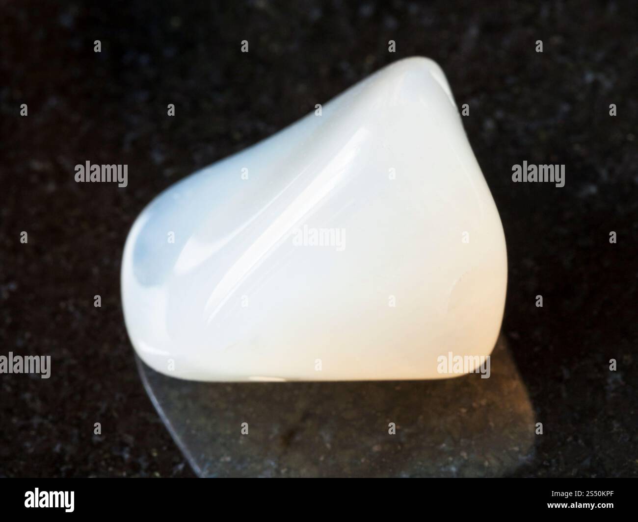 macro shooting of natural mineral rock specimen - tumbled white Agate ...